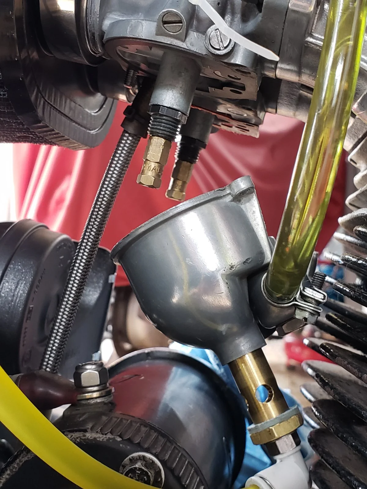 Float bowl drain bolt that also grips the jet holder.. | Access Norton