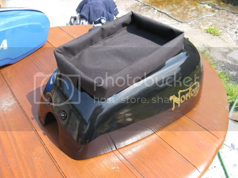 what appears under the radio tray of an Interpol tank ? | Access Norton