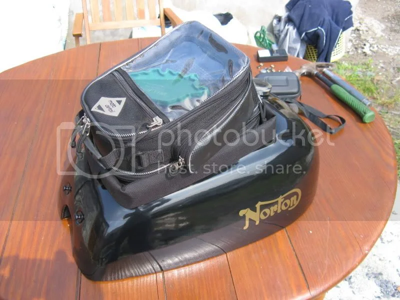 what appears under the radio tray of an Interpol tank ? | Access Norton